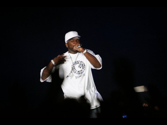 After Cardi B, 50 Cent also throws mic during concert, hitting and ...