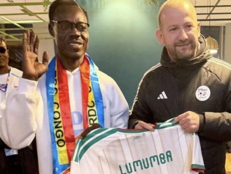 DRC 'Lumumba' statue fan at AFCON meets Algeria’s soccer team after ...